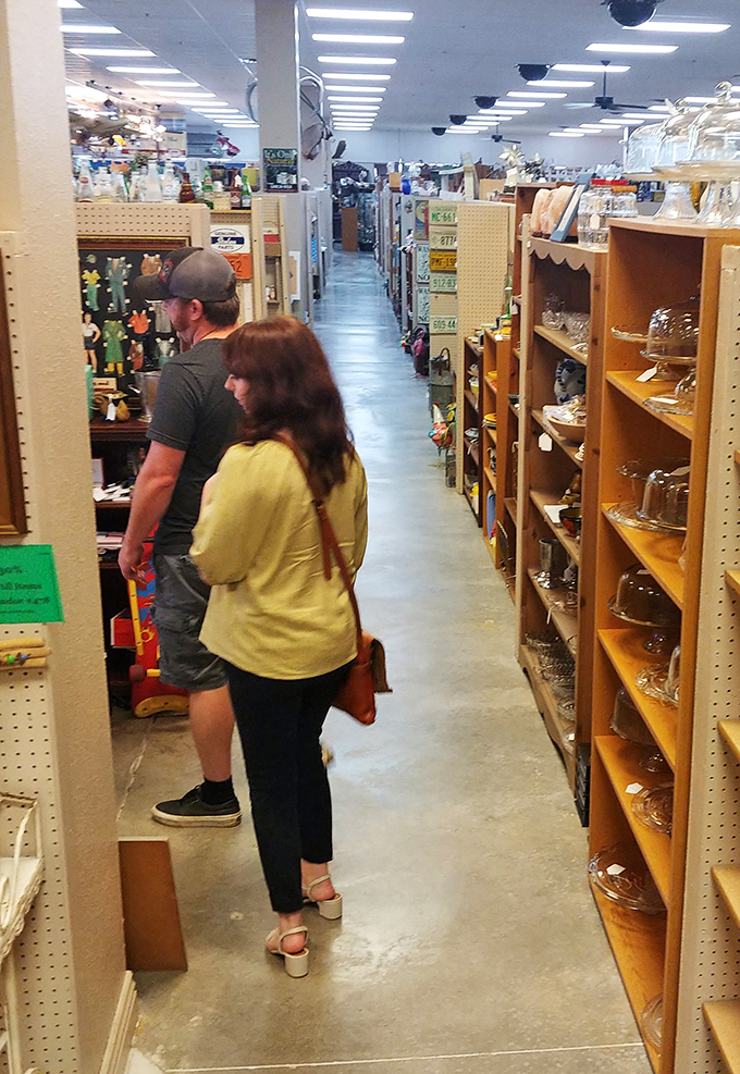 A turquoise desk steals the spotlight in this western-themed corner, where even John Wayne would feel right at home.