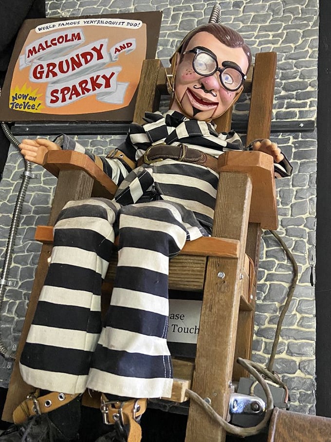 Meet Malcolm Grundy and Sparky, the "world famous ventriloquist duo." This prison-striped dummy looks suspiciously pleased with himself.