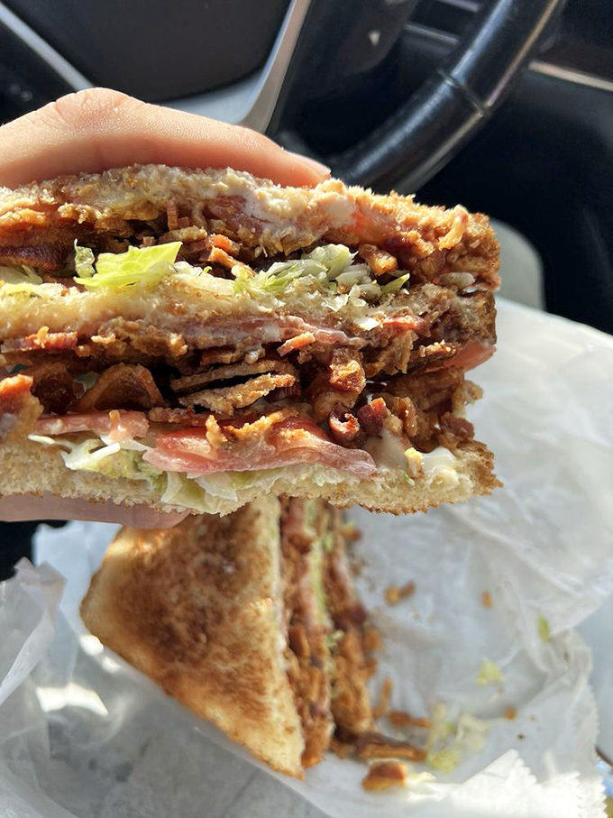 This cross-section reveals the BLT's secret&mdash;bacon layered with the precision of a master jeweler setting diamonds in a royal crown.