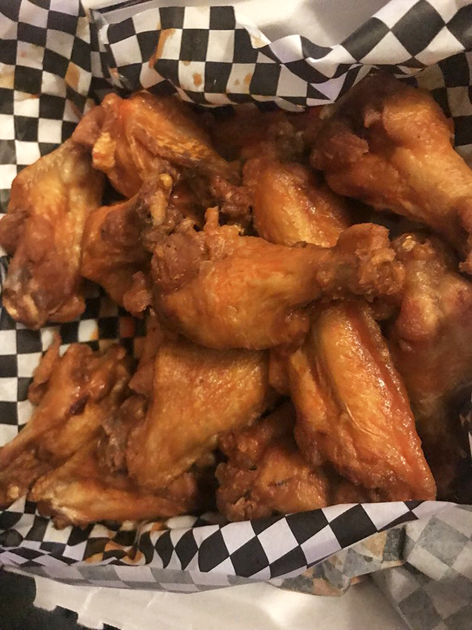 The dozen wings basket – where crispy skin meets juicy meat in a romance more captivating than any reality dating show.