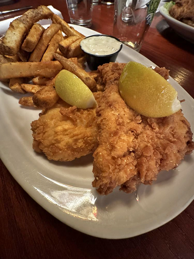 Perfectly fried fish with chips that could make a potato proud. That tartar sauce cup isn't nearly big enough for my dipping ambitions. 