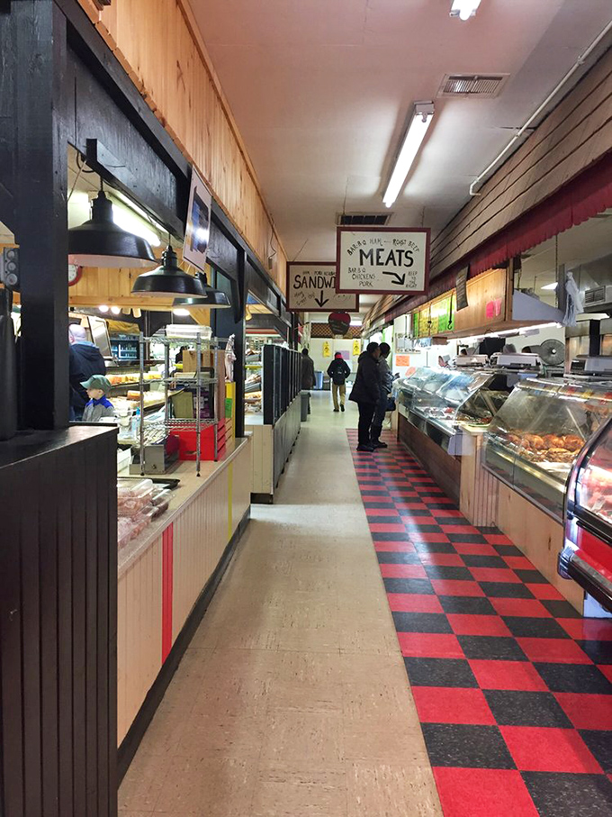 The meat and sandwich section offers a delicious respite from treasure hunting, with the classic checkerboard floor guiding hungry shoppers to their next meal.