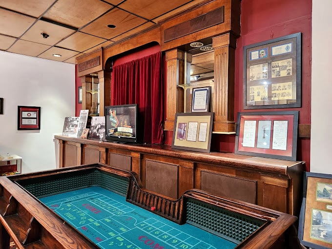 The authentic craps table where fortunes changed hands faster than a card shark's shuffle. The house always won, but oh, what a ride!