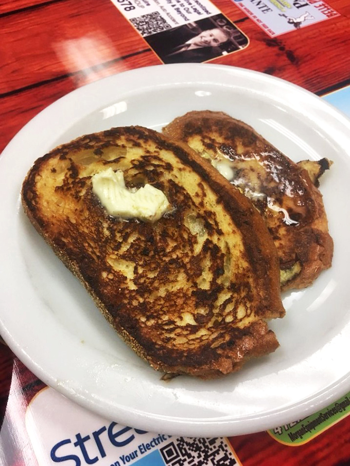 French toast that's achieved the impossible trifecta: crispy edges, custardy center, and that perfect butter-melting temperature. Breakfast nirvana on a plate.