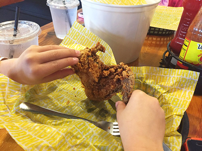 Hands don't lie&mdash;this is chicken worth getting messy for. The yellow wrapper becomes a battlefield of delicious destruction.