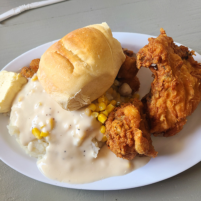 Fried chicken with the kind of golden crust that makes you want to tap it with a spoon like cr&egrave;me br&ucirc;l&eacute;e for that satisfying crackle.