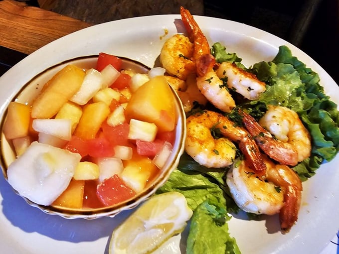 These perfectly grilled shrimp alongside a refreshing fruit medley prove that sometimes the simplest preparations let great ingredients shine brightest.
