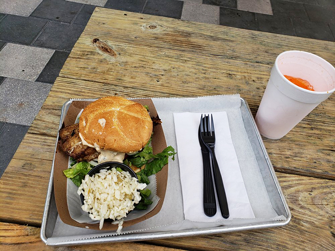 Simple presentation, extraordinary flavor&mdash;this grouper sandwich with coleslaw proves that sometimes the best things in life come on a metal tray.
