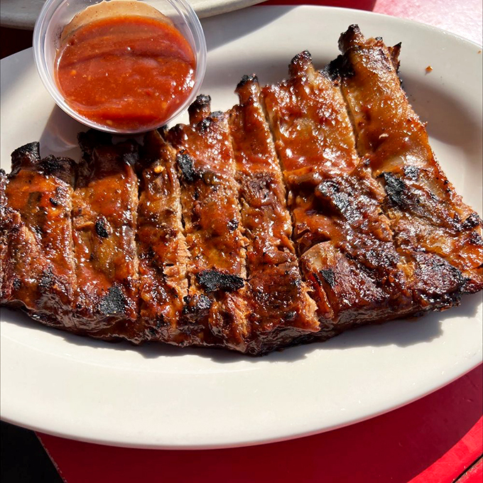 That glossy sheen isn't Photoshop&mdash;it's the perfect marriage of smoke, meat, and sauce creating what can only be described as edible artwork.