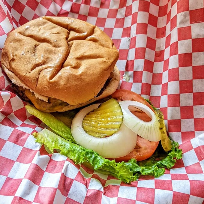 The classic burger in its natural habitat&mdash;red checkered paper. No filters needed when perfection already exists on a bun.