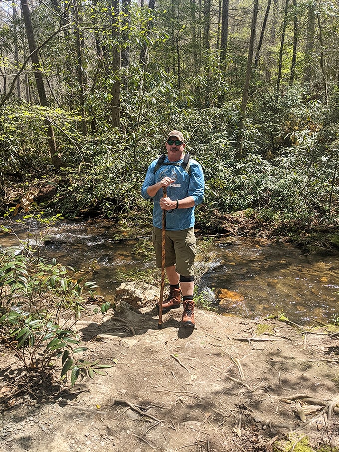 Every great adventure needs proper gear. This hiker demonstrates the classic "I'm ready for whatever this trail throws at me" stance.