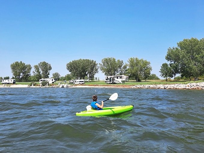 Paddling through the pristine waters of Waconda Lake&mdash;proof that you don't need an ocean to have an aquatic adventure.