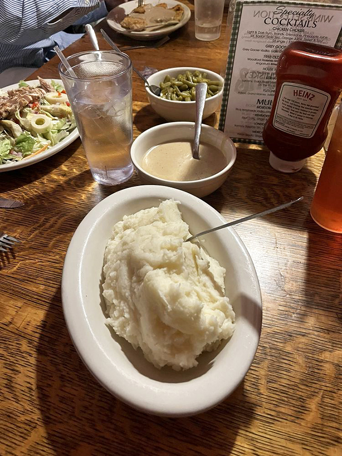 Behold the holy mountain&mdash;creamy mashed potatoes with gravy cascading down like a savory waterfall from the potato gods themselves.
