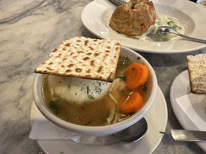 Corned beef hash topped with eggs and hollandaise &ndash; breakfast nirvana achieved! This plate has "nap afterward" written all over it. 
