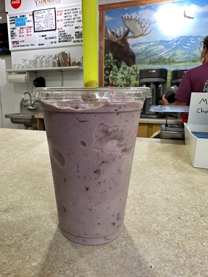 A perfect specimen of the Victor Emporium huckleberry shake. Those purple speckles? Real berry evidence&mdash;nature's way of saying "you're welcome."