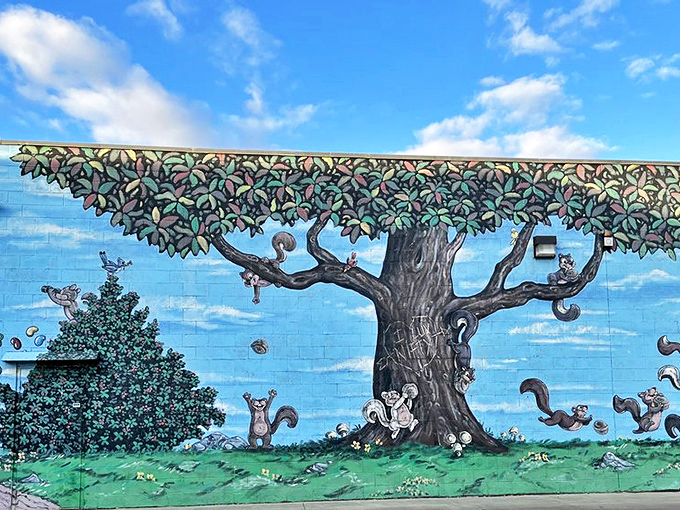 Even the exterior walls tell a sweet story &ndash; playful squirrels frolic around a nut tree in this whimsical mural. 