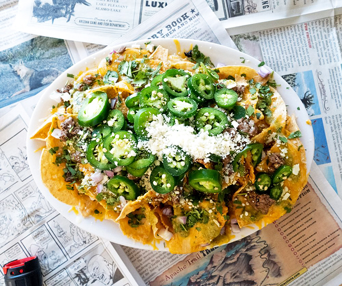 These nachos aren't just loaded&mdash;they're having an identity crisis as a mountain range. Those jalape&ntilde;os mean business, folks.