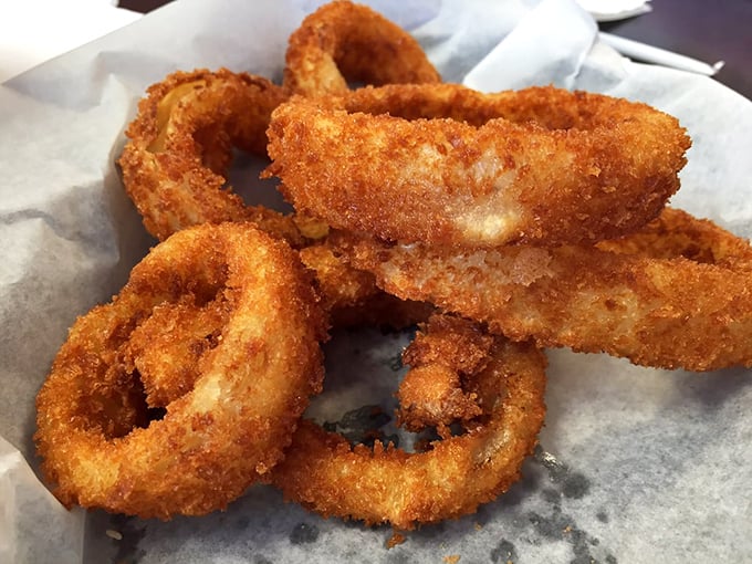 Golden halos of happiness that crunch like autumn leaves. These onion rings aren't just fried&mdash;they're transformed into something transcendent.