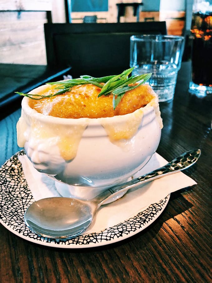 Cheese that stretches toward the heavens like it's trying to touch the divine. This isn't just soup&mdash;it's a religious experience with a spoon.