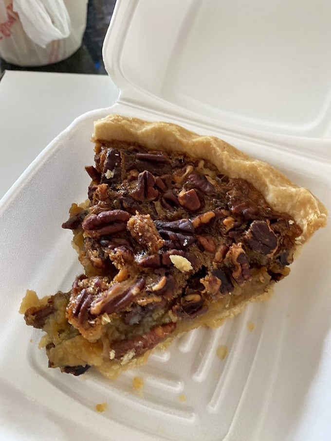 Pecan pie that makes you question every other pecan pie you've ever eaten. The perfect ratio of nuts to filling, encased in a crust that deserves its own fan club