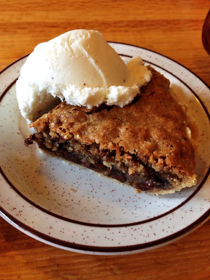 A warm slice of homemade pie with melting ice cream&mdash;proof that happiness doesn't need to be complicated, just properly baked.