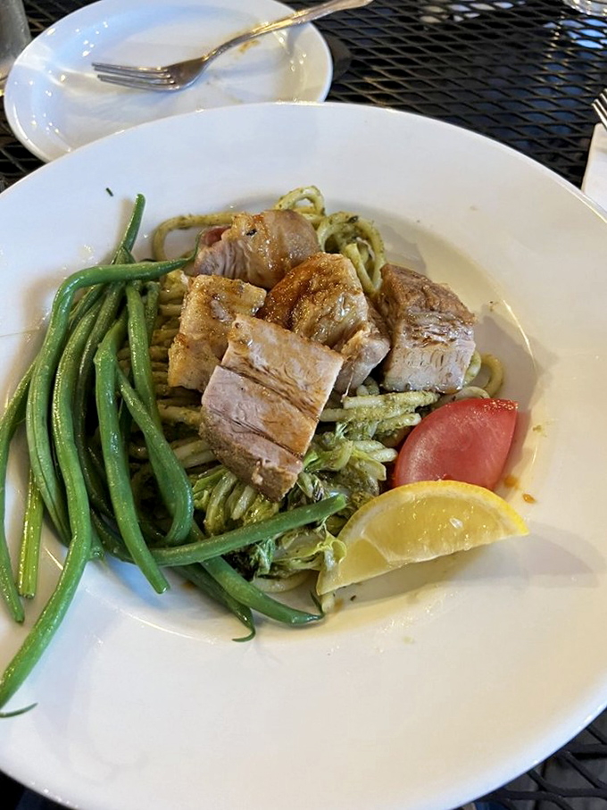 This steak isn't just covered in sauce&mdash;it's wearing a luxurious creamy overcoat that makes everything else on the plate jealous. 