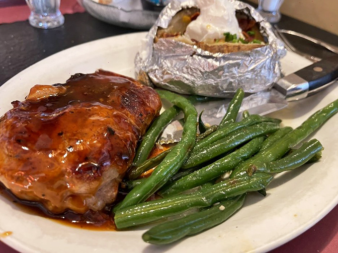 This glazed pork ribeye doesn't just shine&mdash;it practically has its own spotlight, Broadway dreams, and a backup dance crew of green beans. 