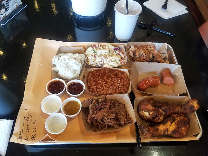 A barbecue feast fit for royalty. The perfect sampler tray lets you experience every smoky, savory masterpiece without choosing favorites. 