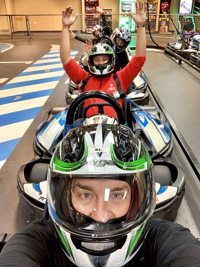 The pre-race lineup—like astronauts before launch, these drivers mentally prepare for the G-forces and glory that await them.