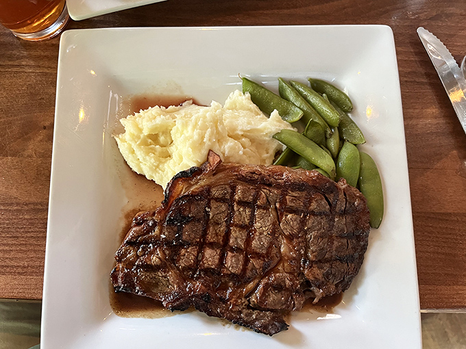 This isn't just a ribeye; it's a masterclass in the art of steak. The crosshatch grill marks are practically frameable. 