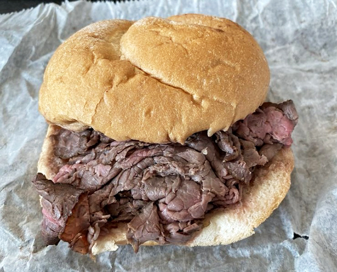 Behold the star of the show&mdash;thinly sliced, steam-softened roast beef piled generously on a kaiser roll. No Instagram filter required for this honest-to-goodness sandwich masterpiece.