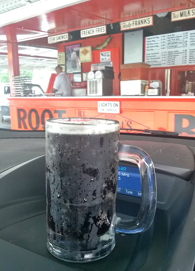 The star of the show in its natural habitat&mdash;a frosty mug of homemade root beer beading with condensation, promising relief from summer heat and modern complications.