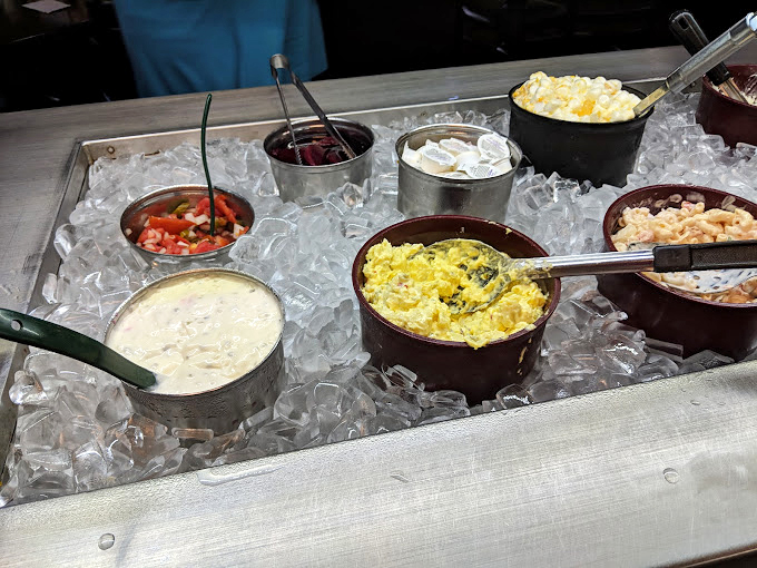 The salad bar's colorful array sits nestled in ice &ndash; proof that "eating your vegetables" can actually be something to look forward to.