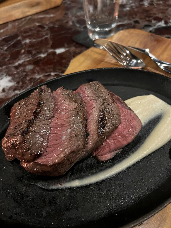 Behold the sirloin&mdash;sliced to showcase that perfect pink center, it's the steak equivalent of catching a Florida sunset at just the right moment.