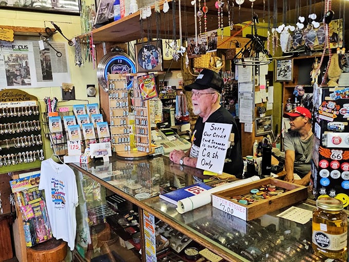 The "Sorry, Our Credit Department Is Out Hunting" sign tells you everything about this cash-only establishment's delightfully old-school business approach.