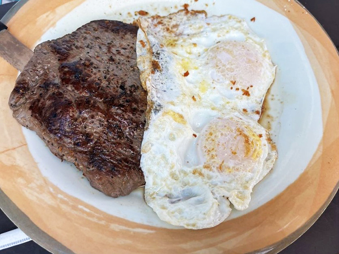 This steak and eggs plate isn't just breakfast&mdash;it's fuel for conquering boardwalk adventures or recovering from last night's beach bar escapades.