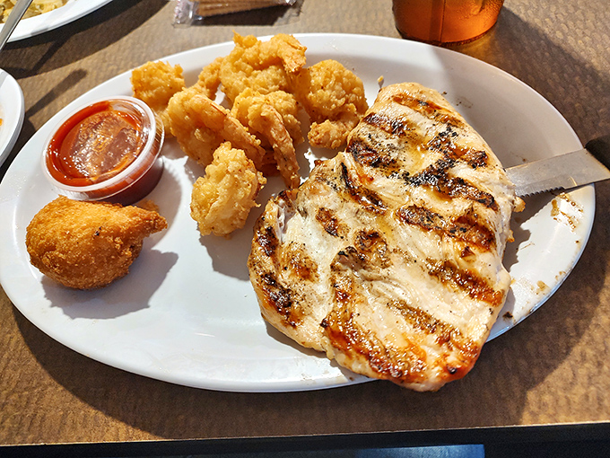 Surf meets turf in perfect harmony. That chicken looks like it auditioned for a part in "Delicious: The Movie" and got the starring role.