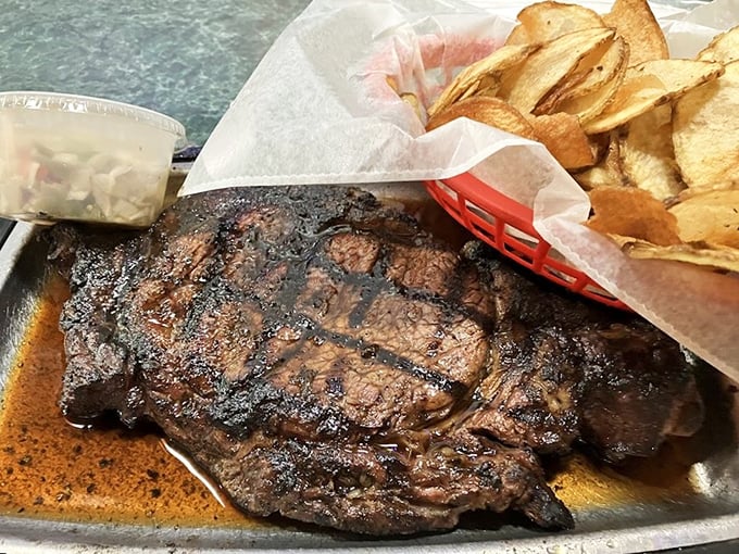 When your steak arrives with its own area code, you know you've found a special place. The grill marks tell stories of perfect timing.