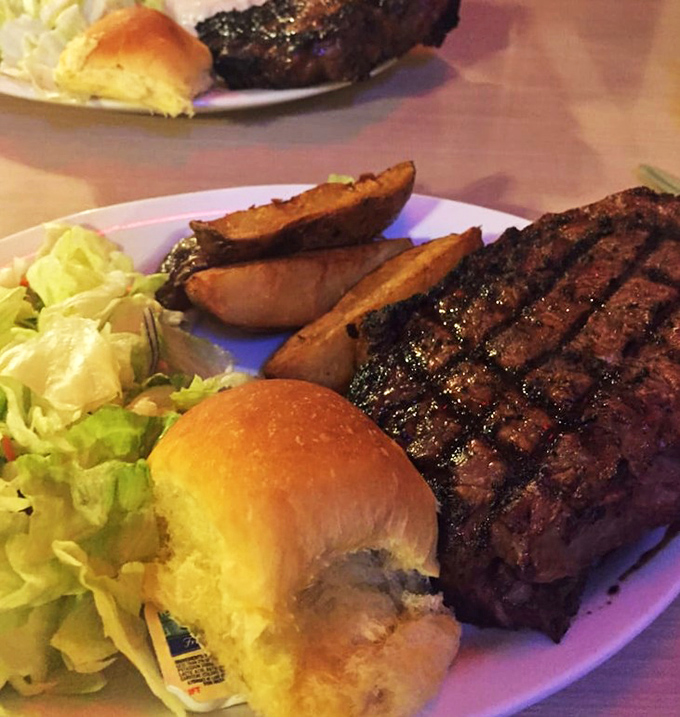 This strip steak with its textbook grill marks isn't just dinner &ndash; it's edible artwork that happens to taste even better than it looks. 