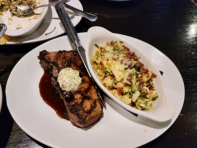 This strip steak with Brussels sprouts looks like it's auditioning for a magazine cover. The herb butter slowly melting atop is nature's perfect sauce.