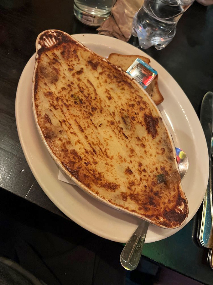 When that fork breaks through the toasted potato peaks of Shepherd's Pie, it's like discovering the eighth wonder of the culinary world.