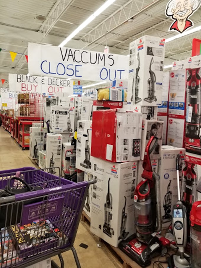 A vacuum cleaner battalion stands at attention, ready to be adopted by shoppers who never planned to purchase cleaning equipment when they woke up this morning.