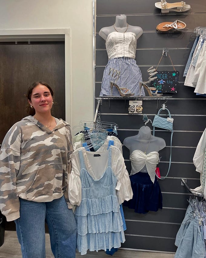 Fashion displays create a boutique feel with carefully curated outfits that prove secondhand doesn't mean second-rate style.