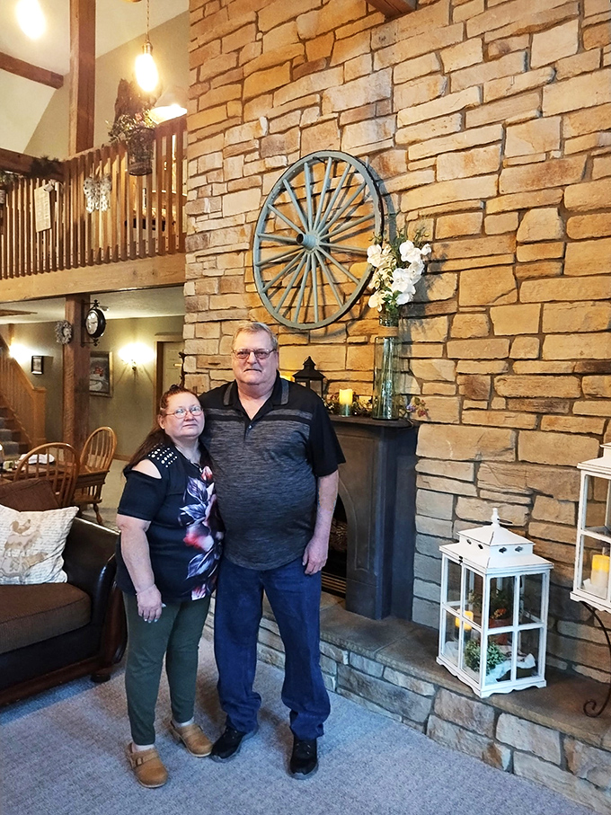 The impressive stone fireplace serves as the heart of the inn, where stories are exchanged and memories are kindled alongside the flames.