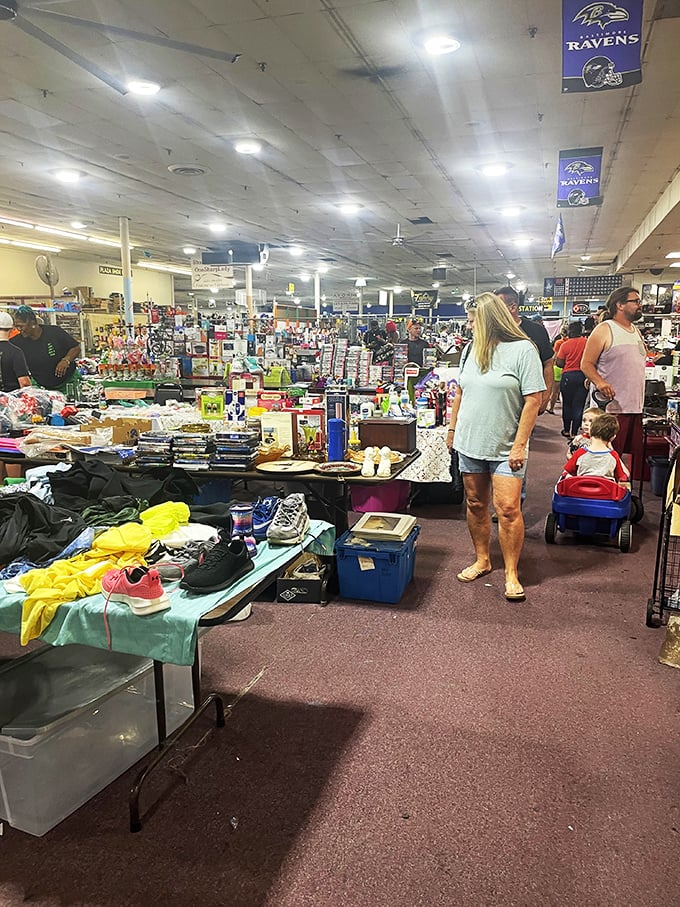 Ravens banners watch over shoppers like purple guardians of commerce. In Baltimore, even bargain hunting happens under the watchful eye of the home team.