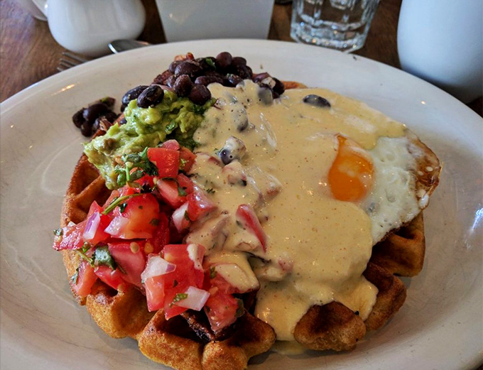 This isn't just a burger, it's breakfast architecture &ndash; a perfect egg crowning a masterpiece of morning indulgence, with hand-cut fries standing guard. 