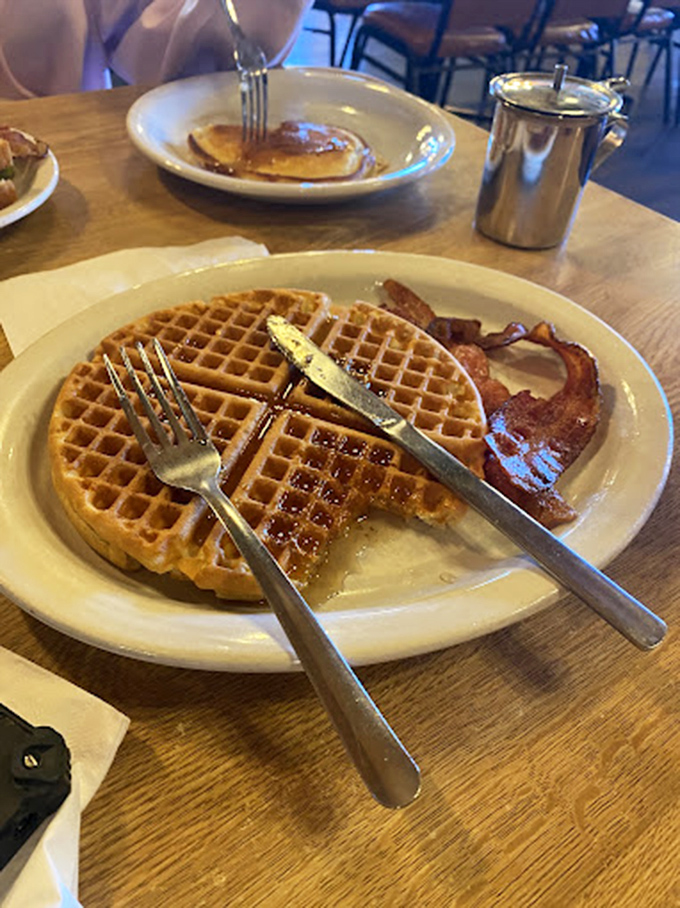 The classic combo that's launched a thousand road trips. That waffle and bacon pairing is the breakfast equivalent of Redford and Newman.