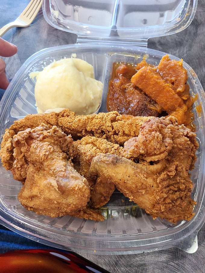 The perfect trifecta: crispy wings, buttery mashed potatoes, and candied yams that taste like Thanksgiving decided to visit on a random Tuesday.