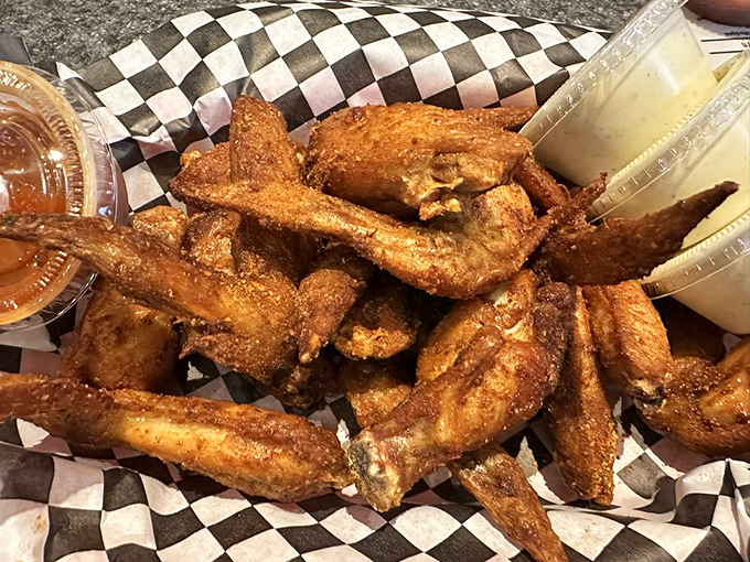 Smoke-kissed wings that look like they've been blessed by the barbecue gods&mdash;these aren't just appetizers, they're life-affirming experiences.