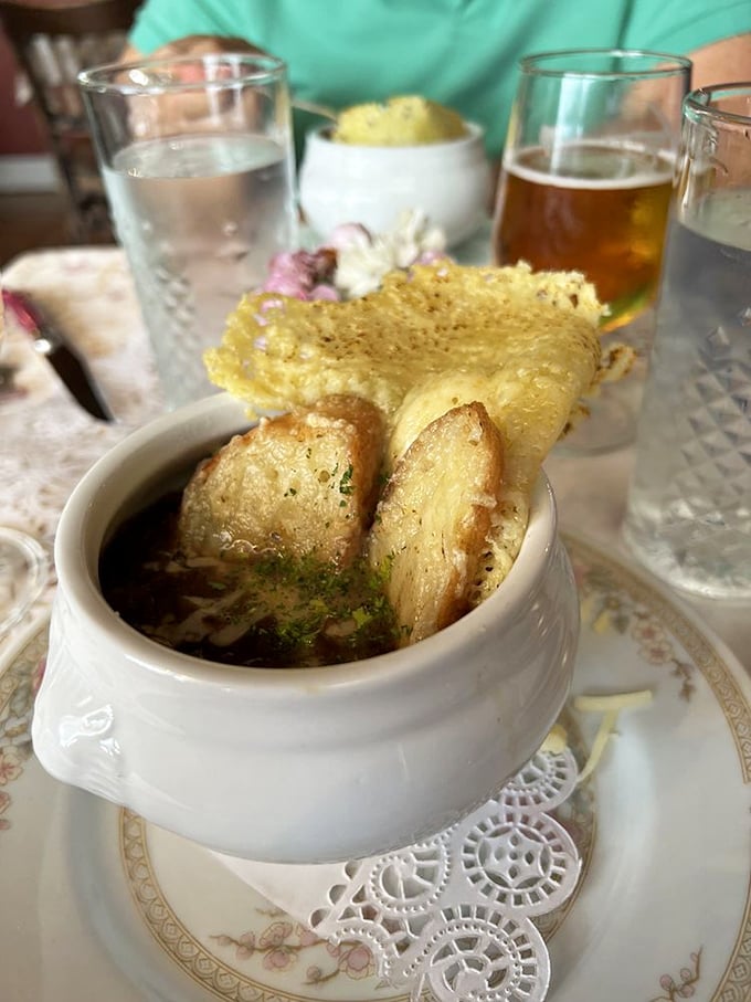French onion soup so authentic you'll check your phone to see if it somehow teleported you to a Parisian caf&eacute;. That cheese pull deserves its own Instagram account.